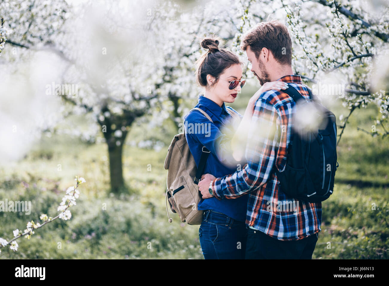 Young couple hugging Stock Photo - Alamy