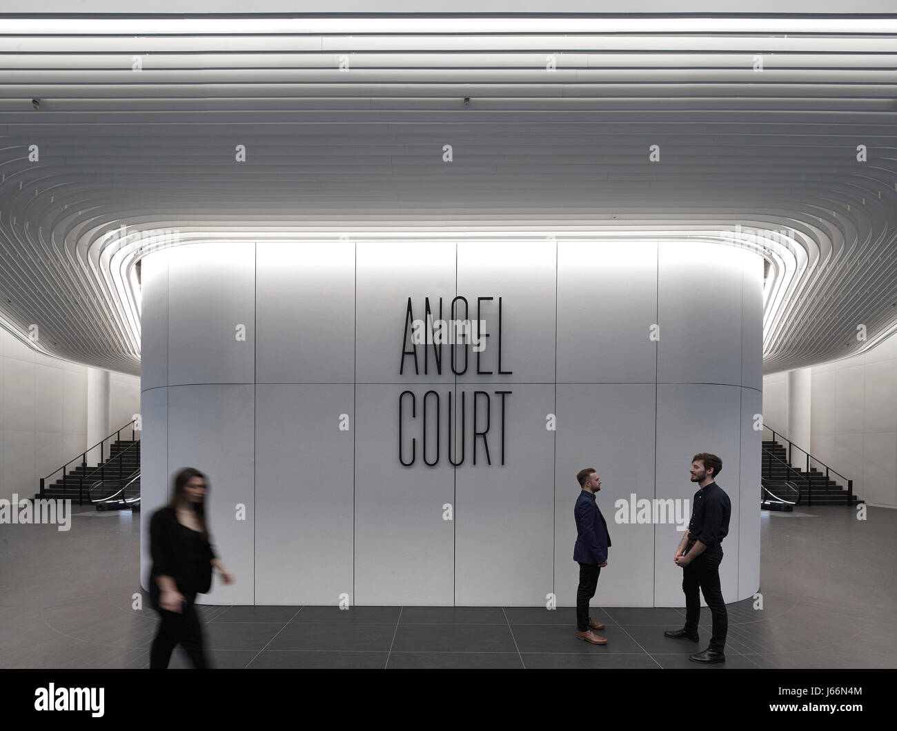 Ground floor reception area with people. Angel Court, London, United ...