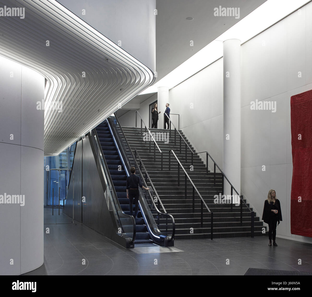 Ground floor reception area with people. Angel Court, London, United ...