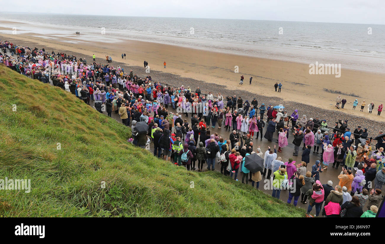 People take part in a world record attempt to get more than 2,000 ...