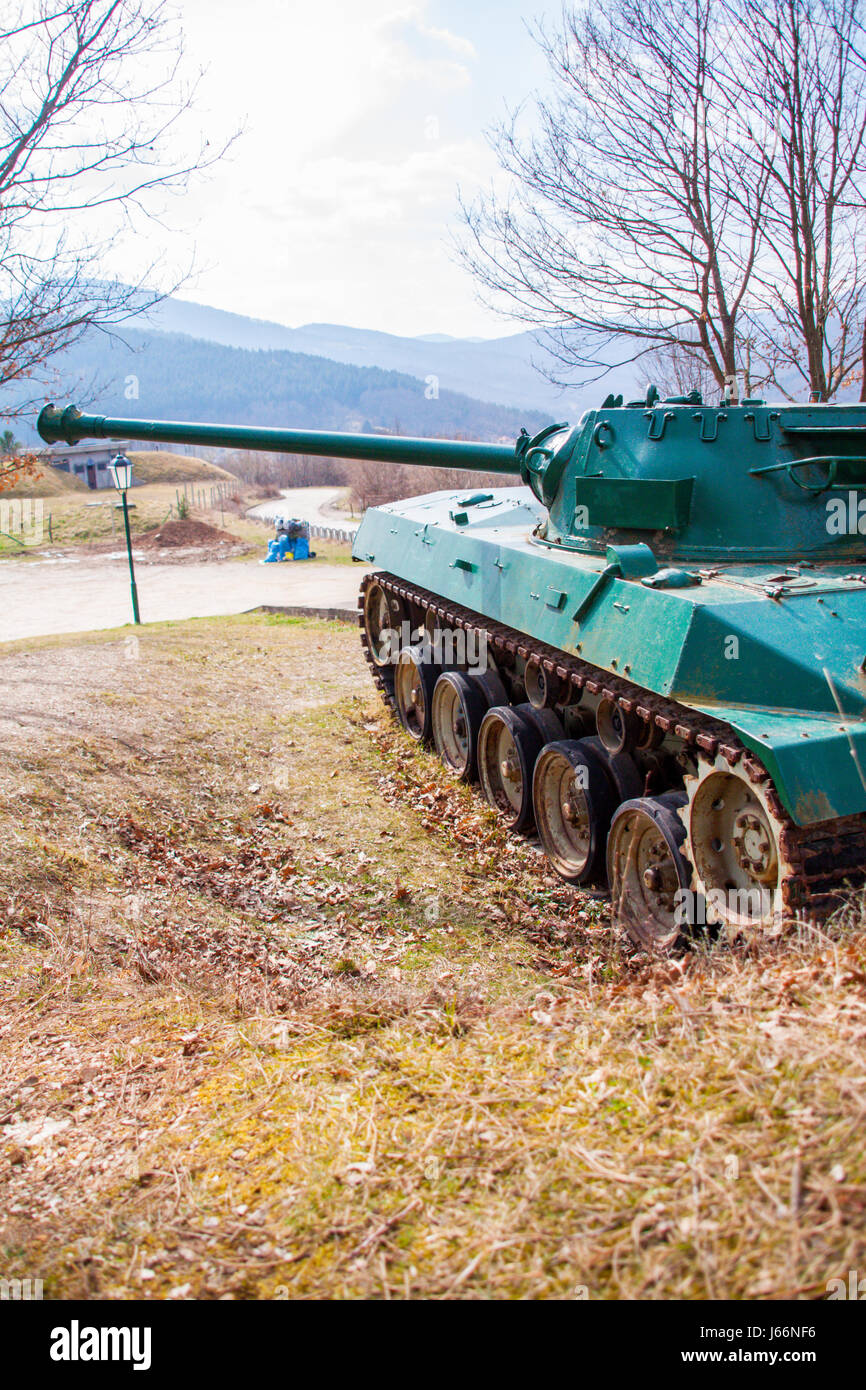 War artillery, tank shelling in the position of town, tube pointing ...