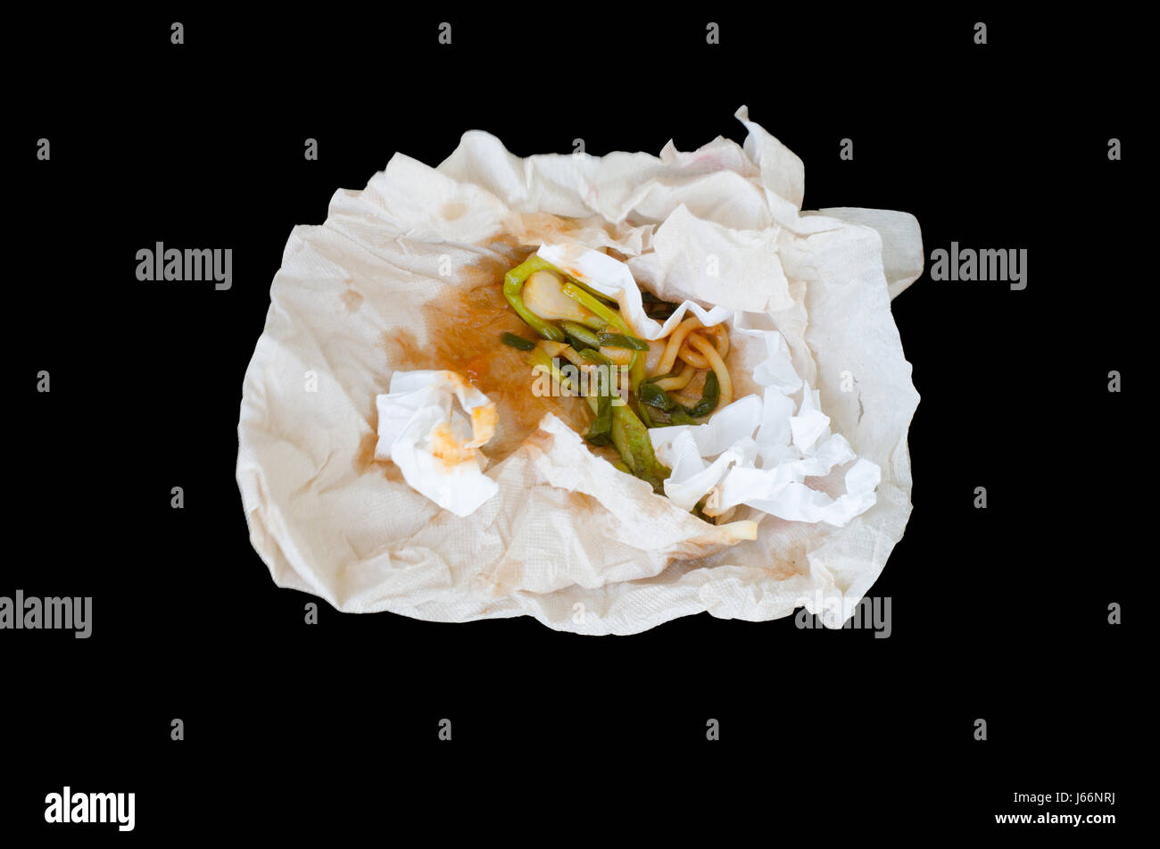 Tissue paper wraping waste food isolated on black background Stock ...