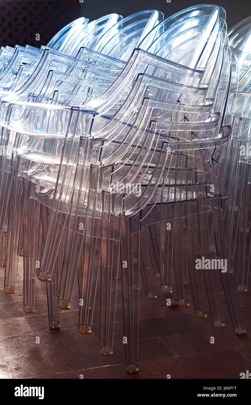 Pile of plastic chairs hi-res stock photography and images - Alamy