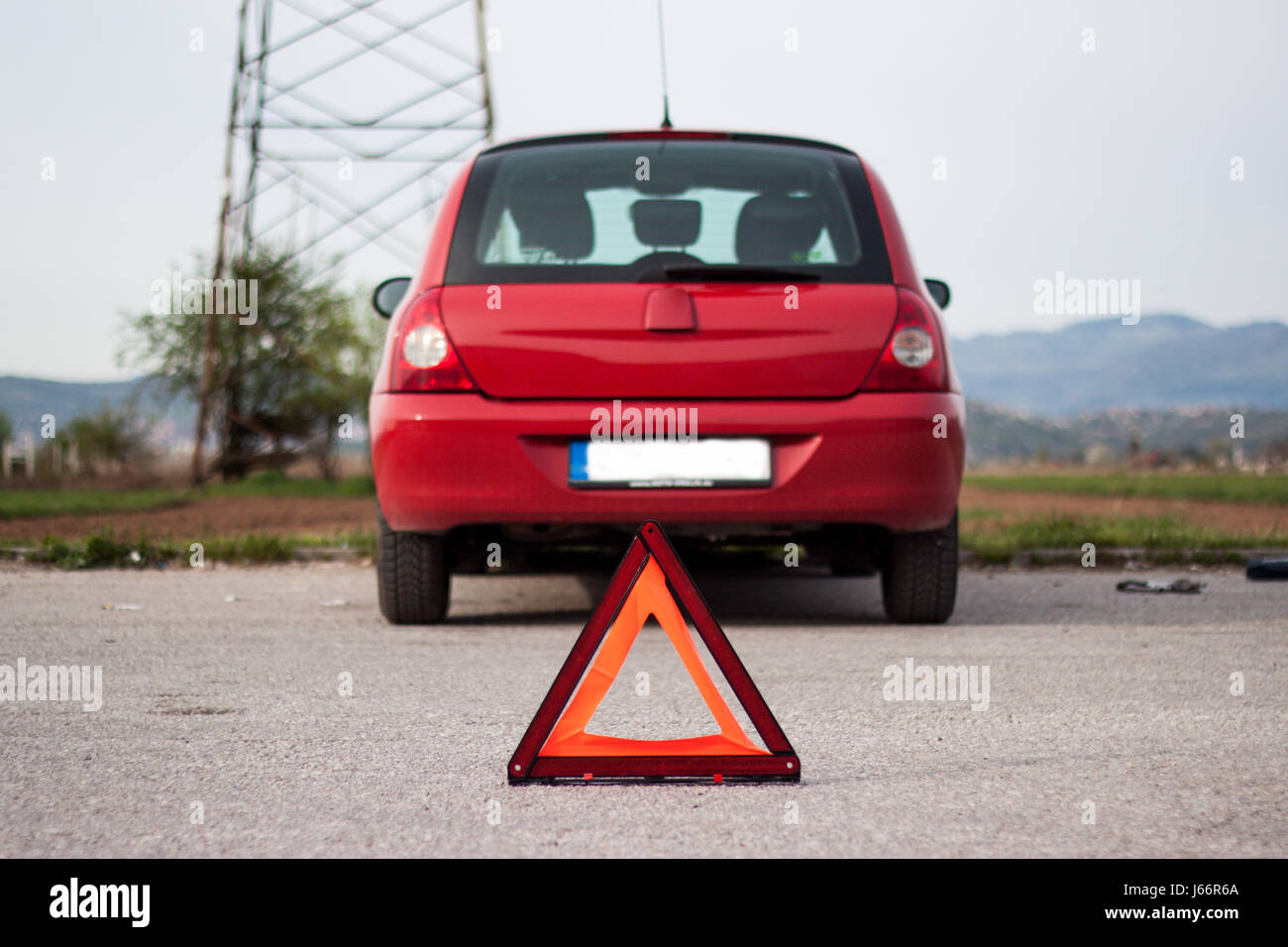 Car other broken road red triangle placed behind the car Stock Photo ...