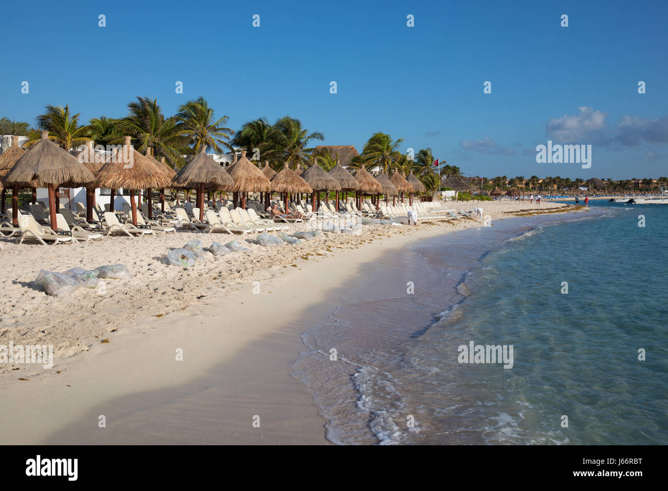 Tropical beachfront with white sand and blue ocean. Tulum, Mexico Stock ...