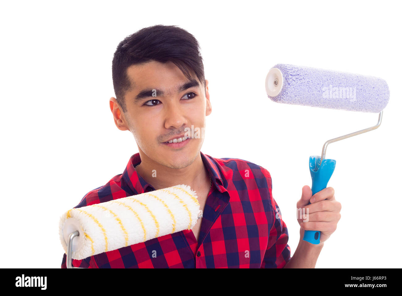 Young man holding two rolls Stock Photo - Alamy