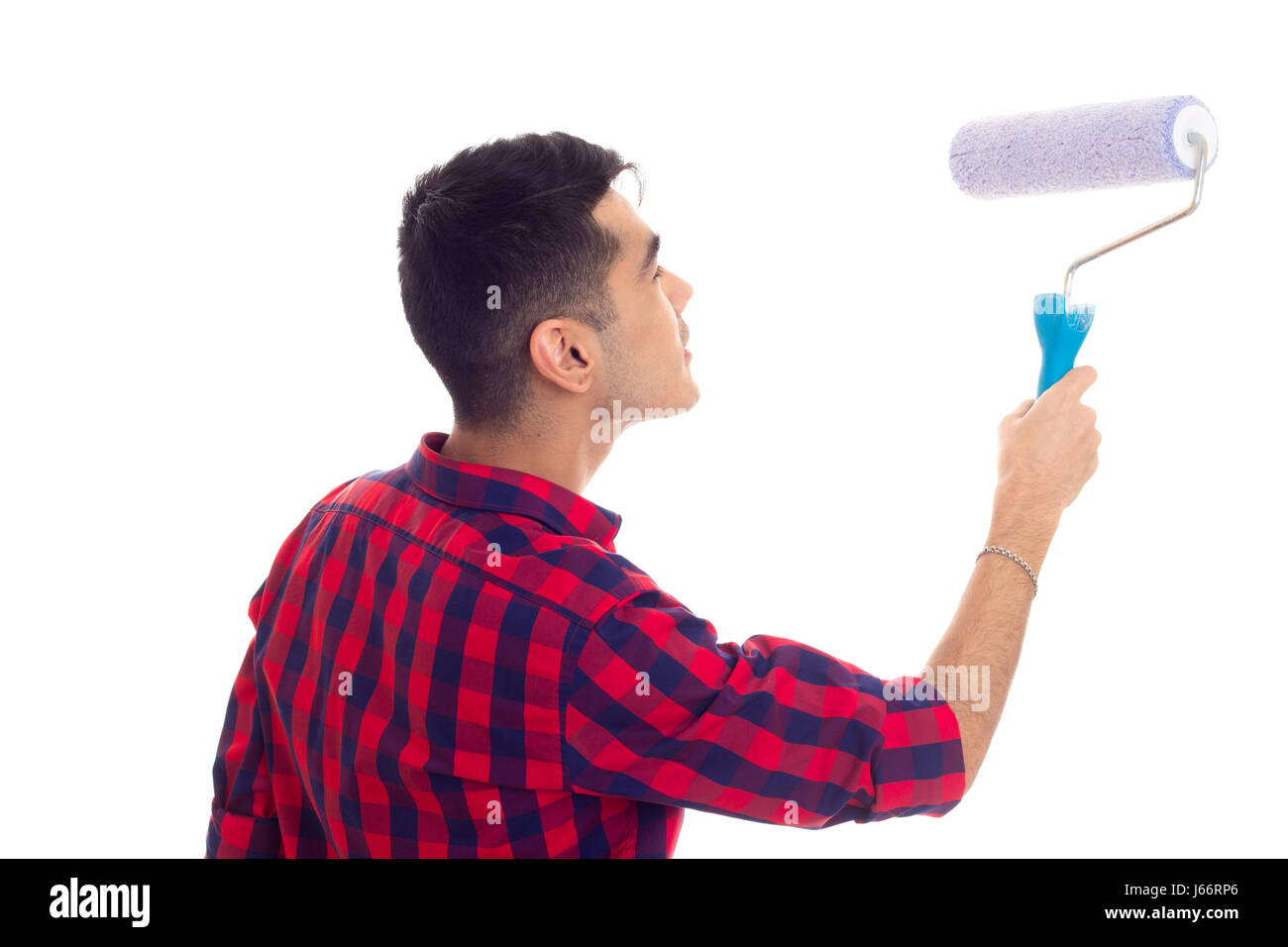 Young man using blue roll Stock Photo - Alamy