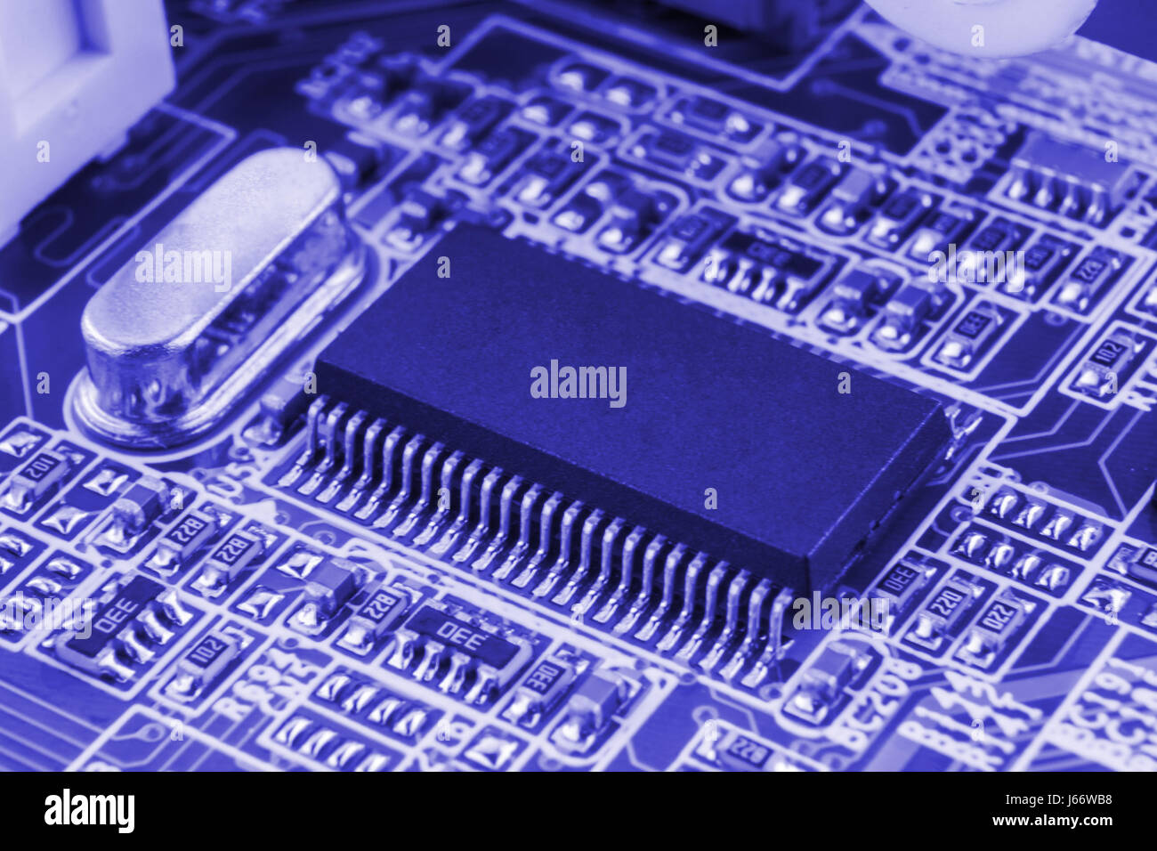 Chip on motherboard mainboard with controllers, ports and wires, close ...