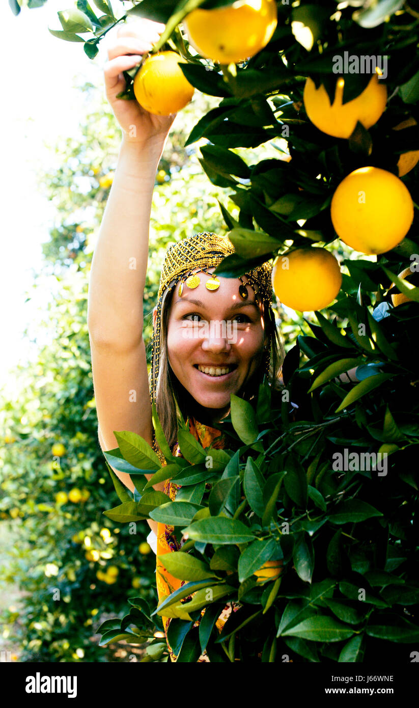 pretty islam woman in orange grove smiling, real muslim girl cheerful ...