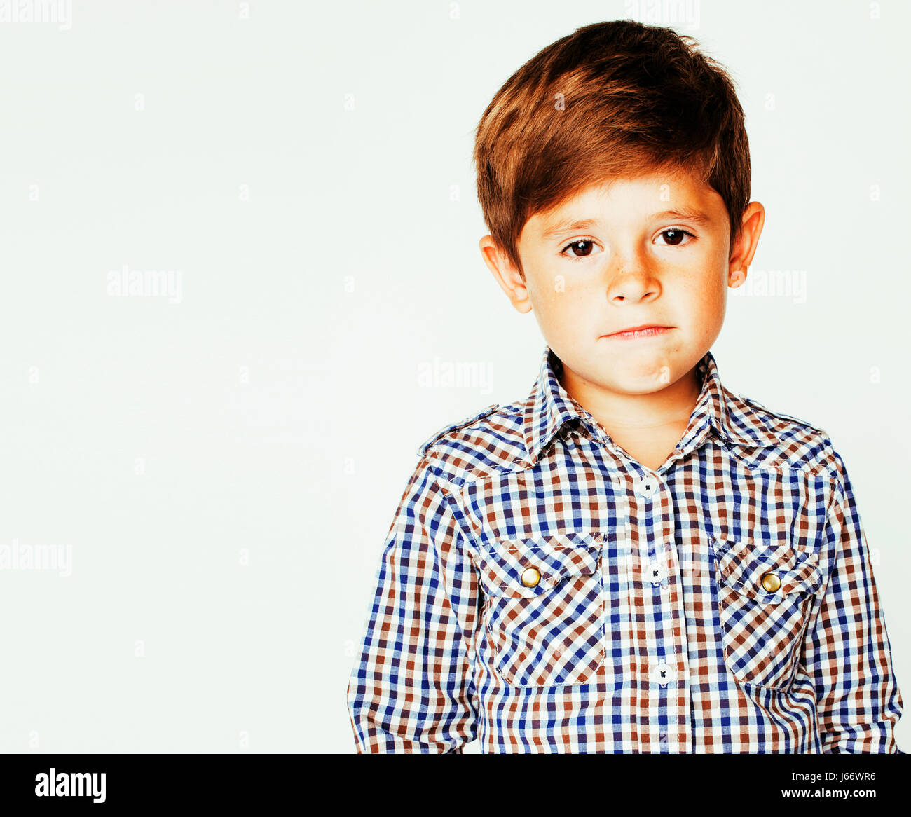 young pretty little cute boy kid wondering, posing emotional face ...
