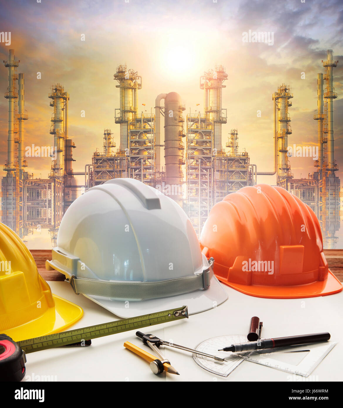 engineer working table plan, and oil refinery plant in heavy ...