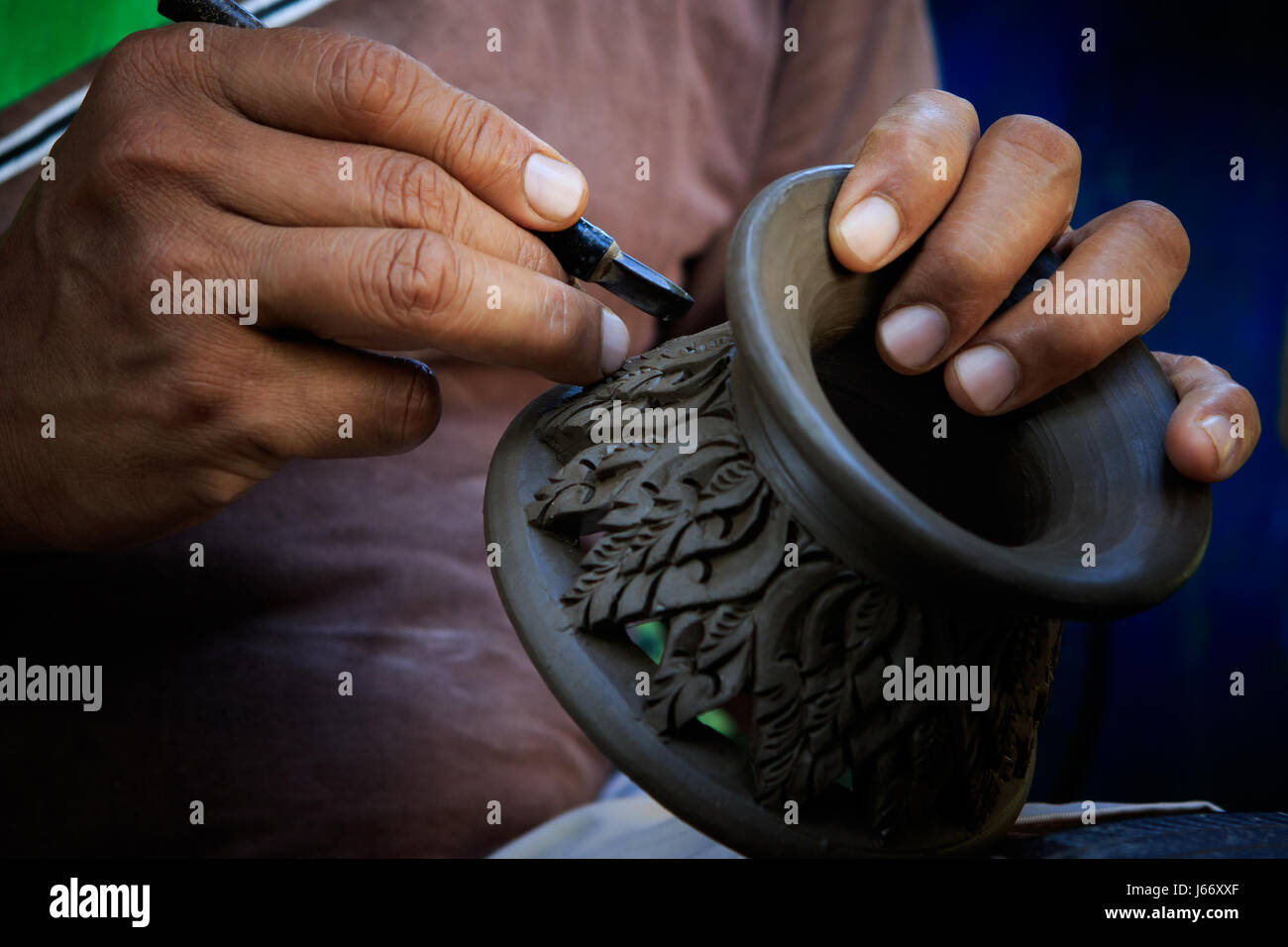 close up potter artist working on clay pottery sculture fine art in ...