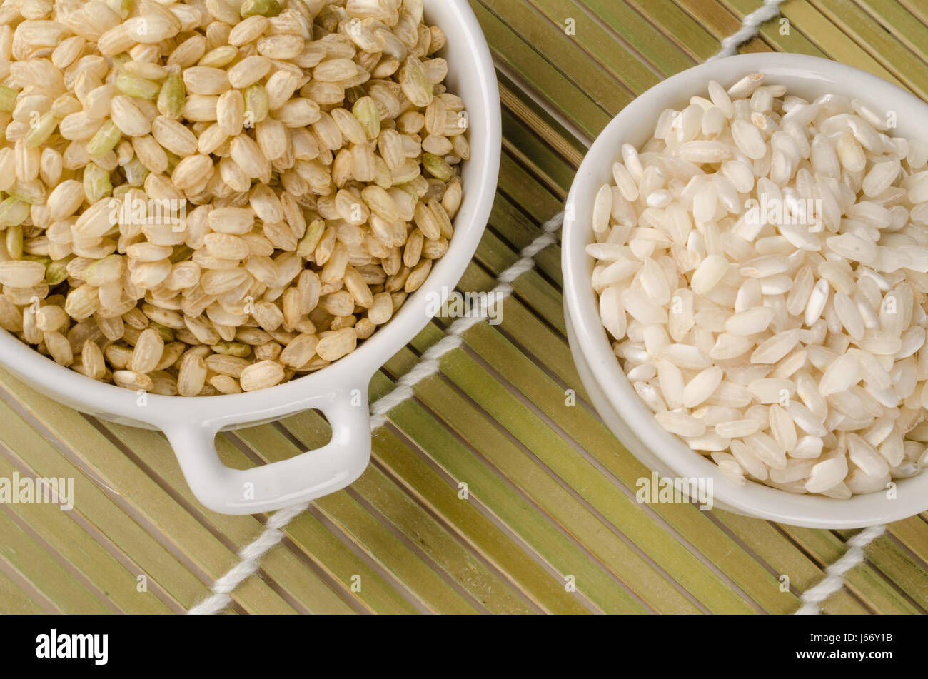Whole and long grain white rice Stock Photo - Alamy