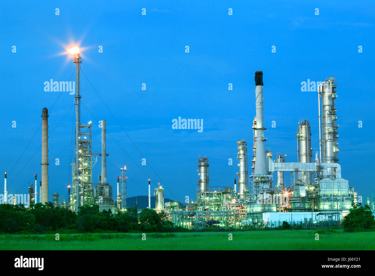 beautiful lighting of oil refinery industry estate plant with fresh and ...