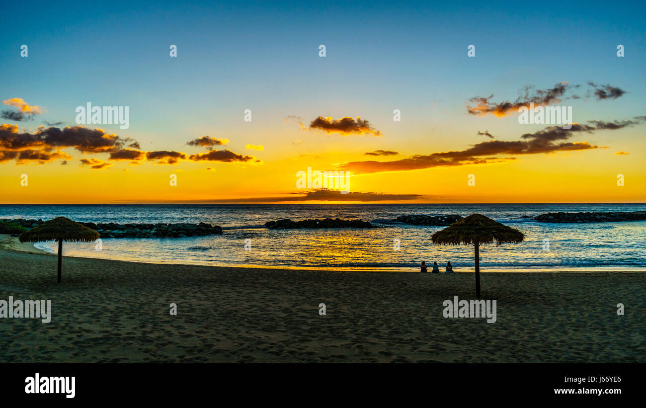 Sunset over the beach of Honu Lagoon, the 2nd lagoon, and the Pacific ...