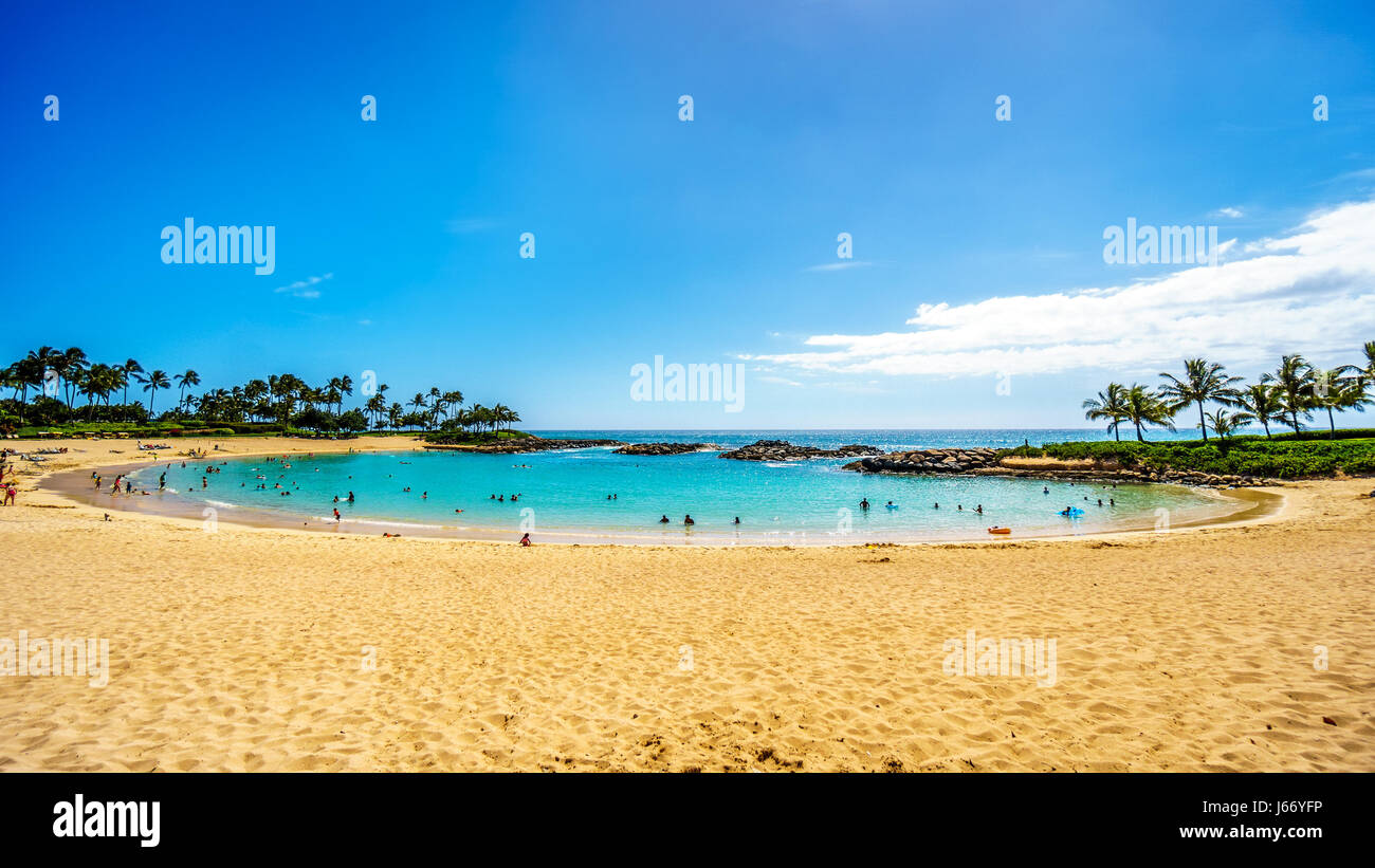 Blue sky and and white sand at Ko Olina Lagoon 3, named Nai'a Lagoon ...