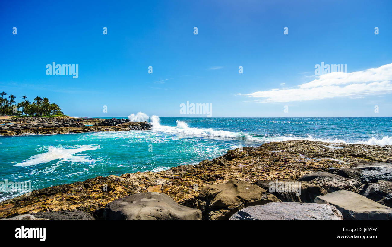 Waves breaking on barriers of the lagoons at Ko Olina, on the West ...