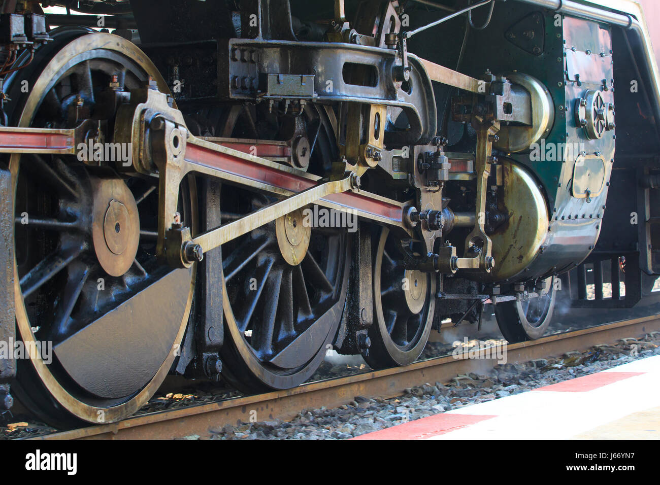 iron wheels of stream engine locomotive train on railways track ...