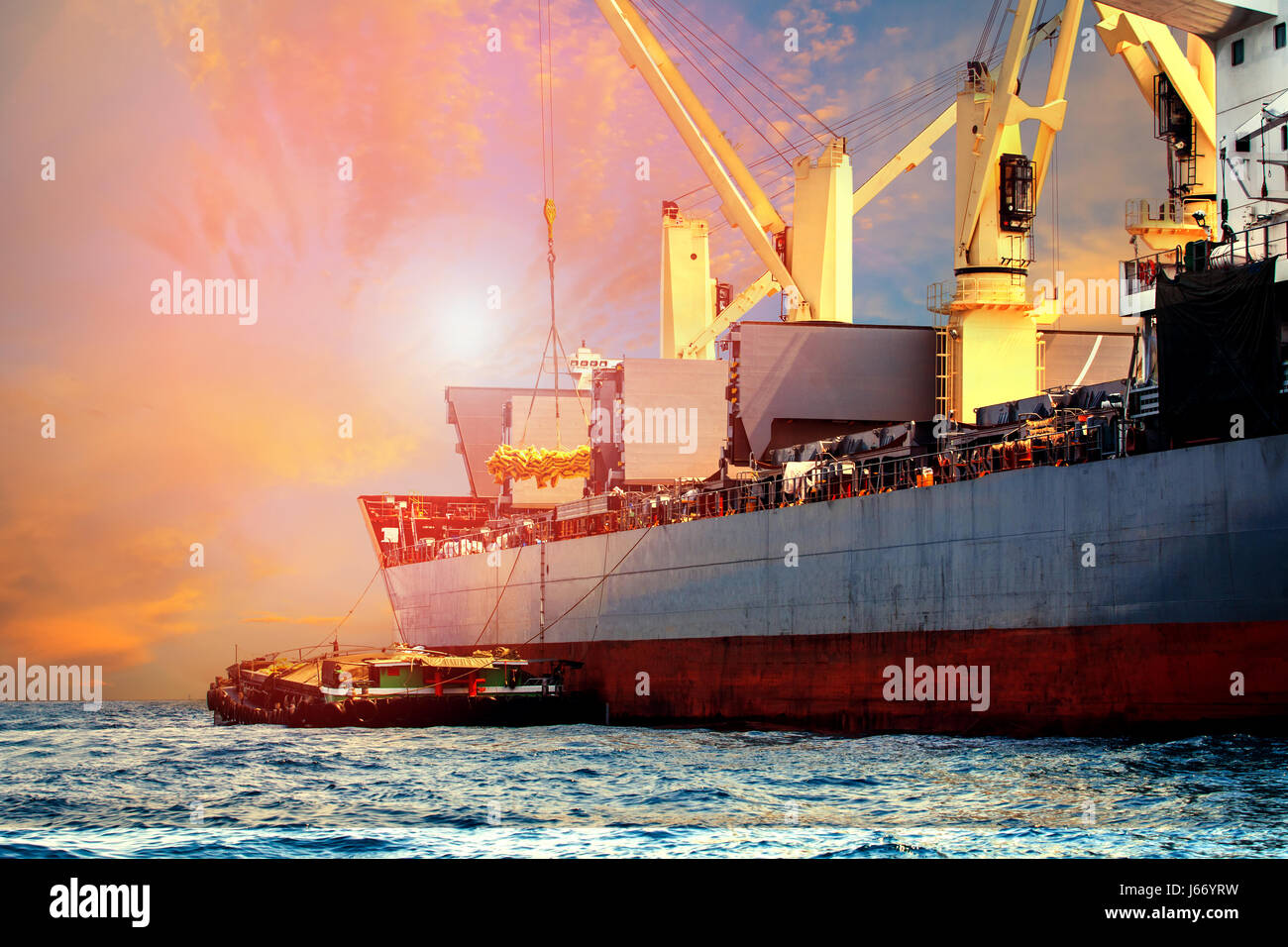 floating container ship loading rice and food product into storage use ...
