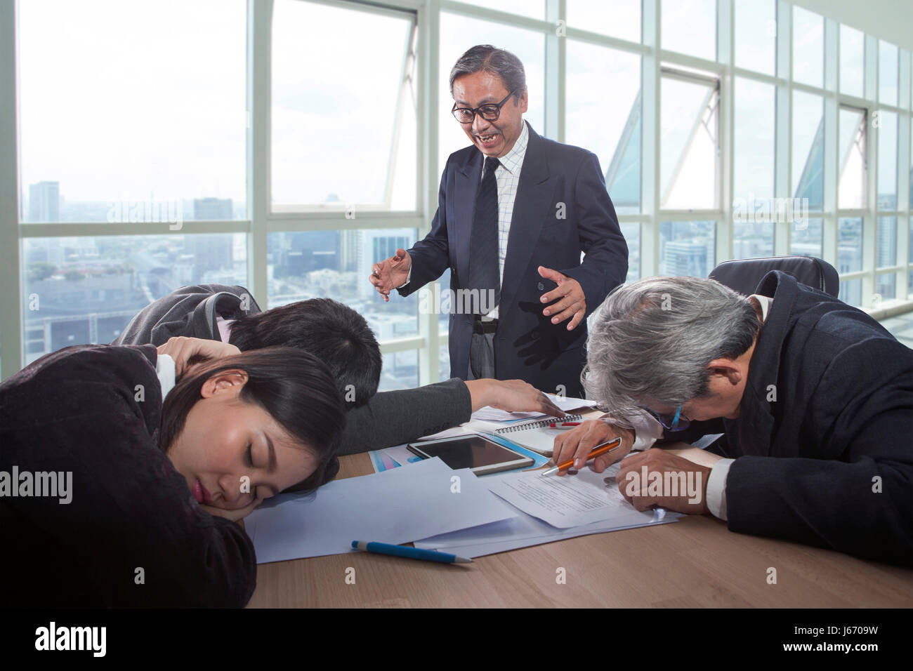 crazy business man in office meeting room Stock Photo - Alamy