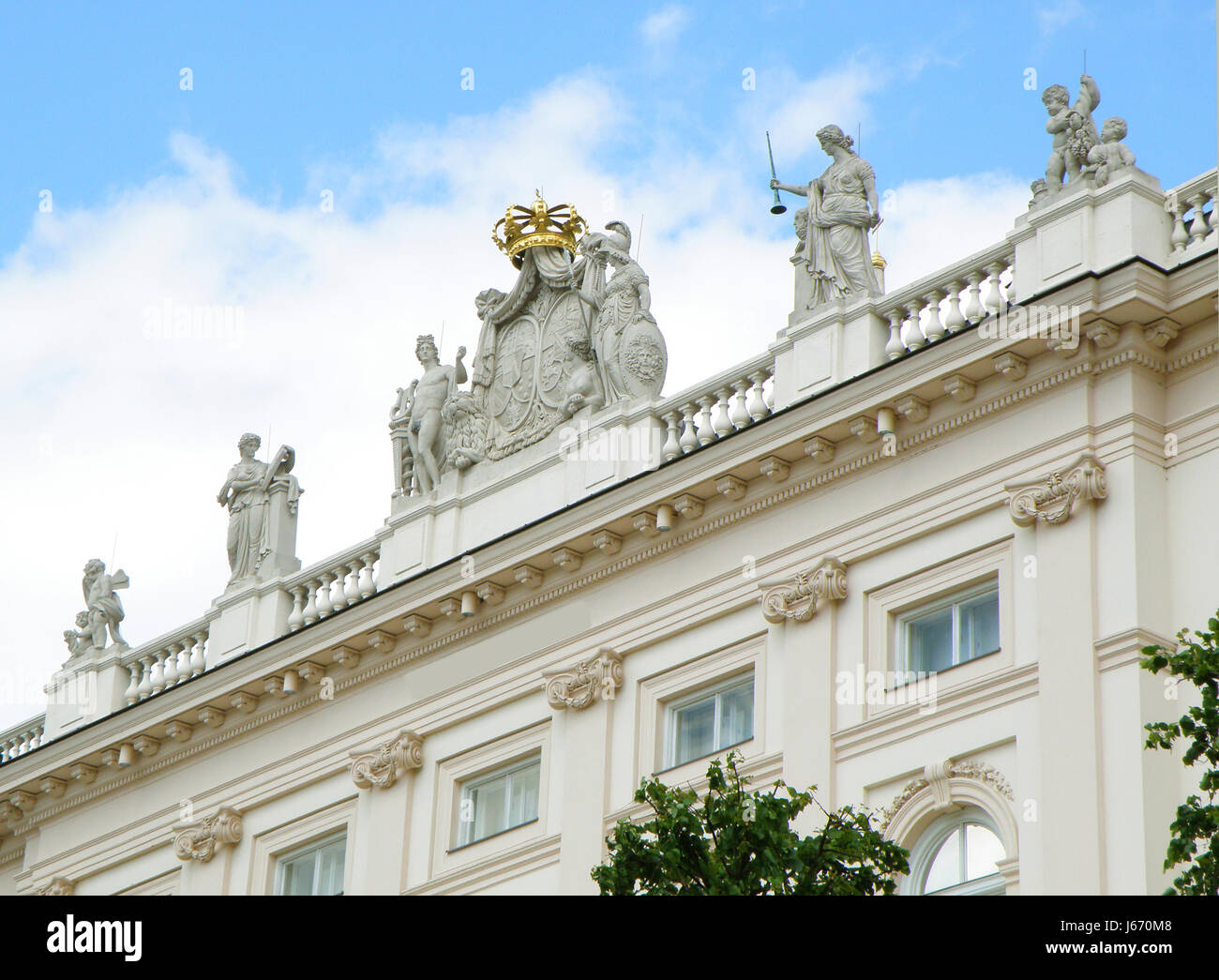 Stunning facade with many beautiful sculptures of a white building in ...
