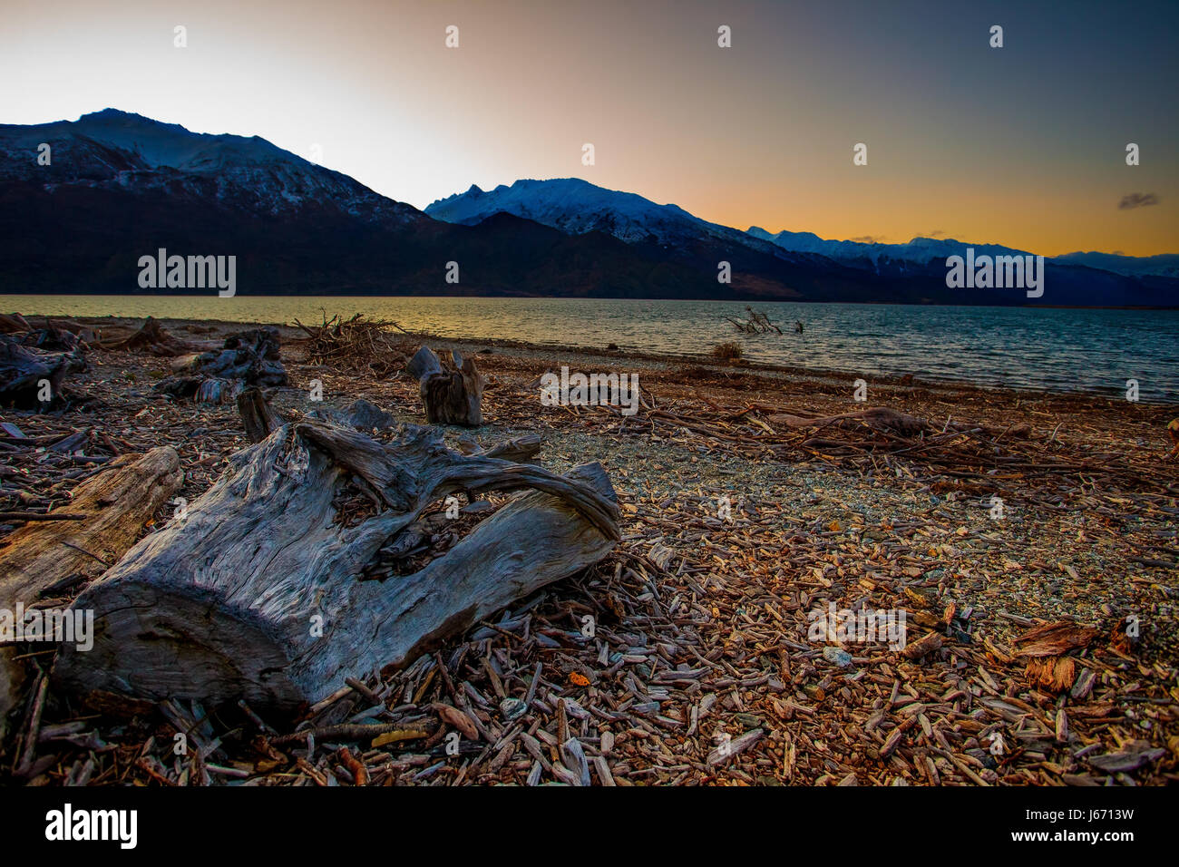 beautiful landscape dusky sky and cutting tree stump and wankak lake ...
