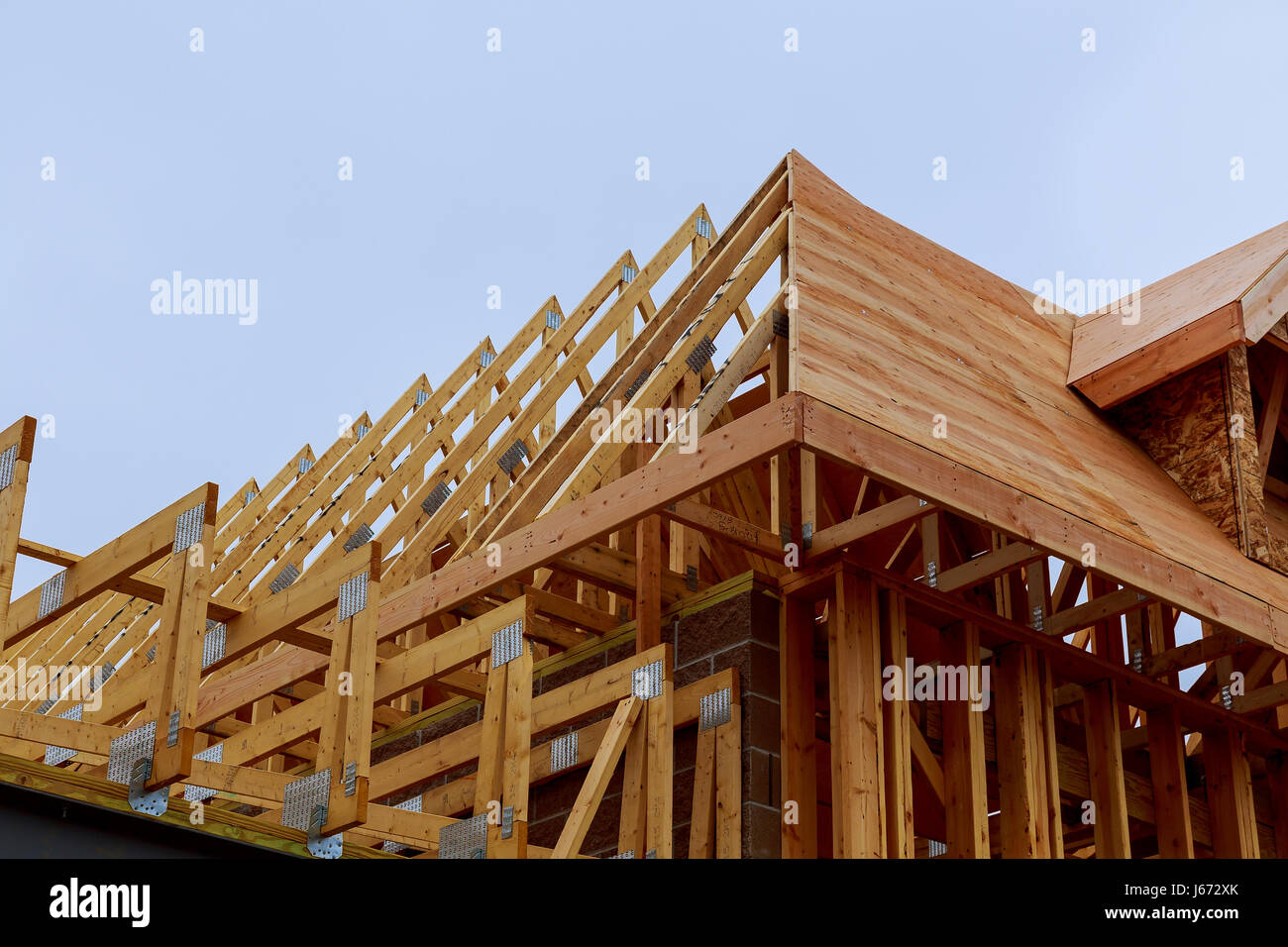 New house construction with frame New construction of a house Framed ...