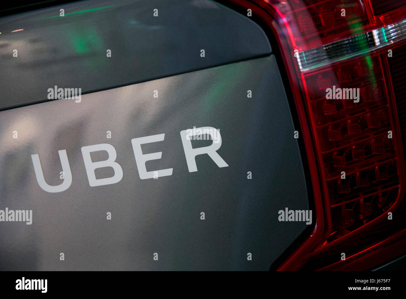 An Uber logo on a Uber Technologies Inc., self-driving autonomous Volvo ...