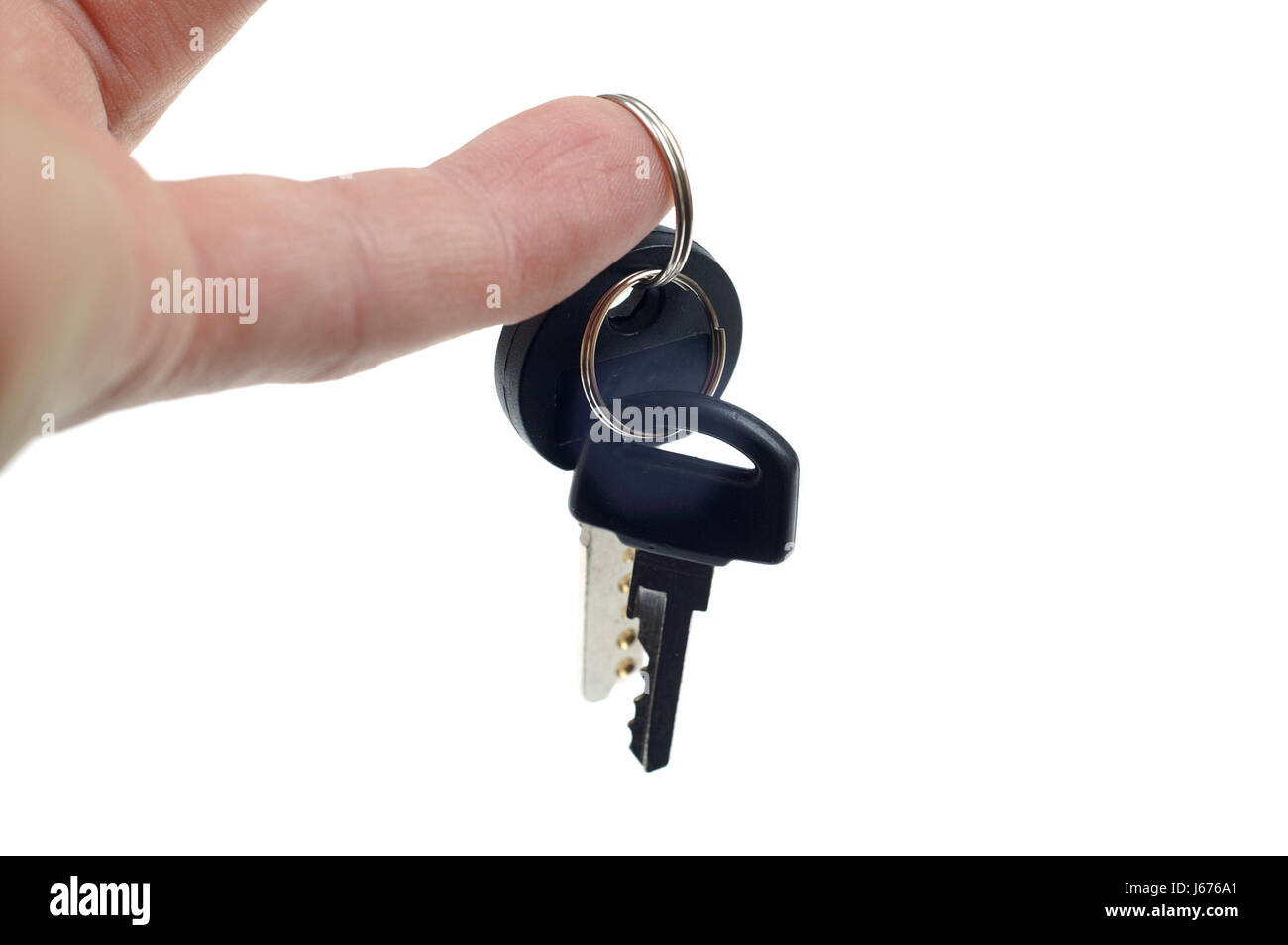 finger isolated closeup key possession holding white hand finger macro ...