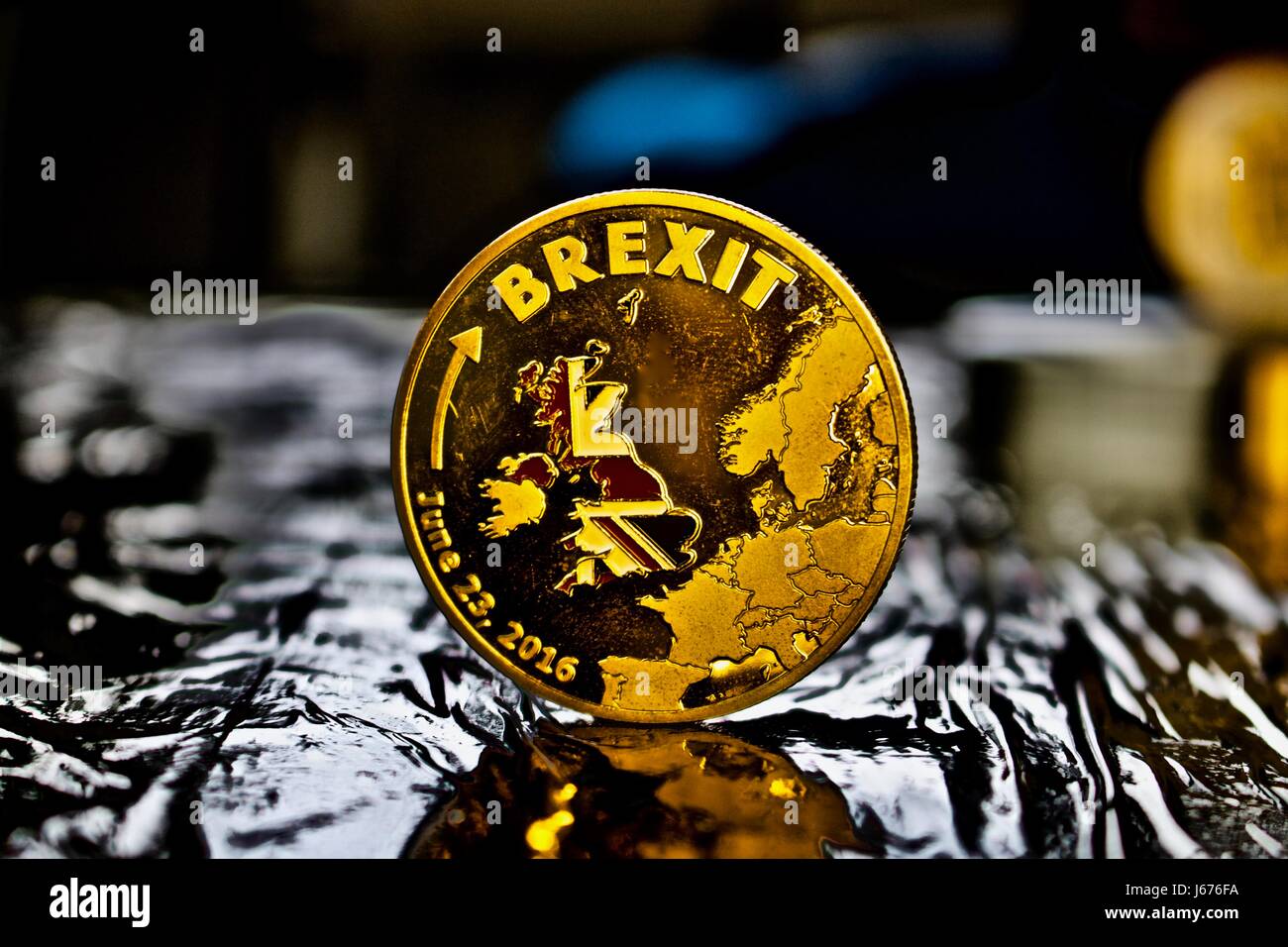 EU LEAVING - Gold brexit coin Stock Photo - Alamy