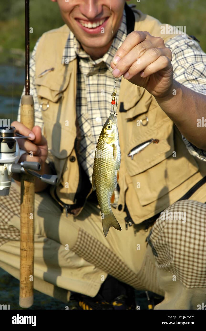 fishing fisherman angler guy hand hands sport sports male masculine ...