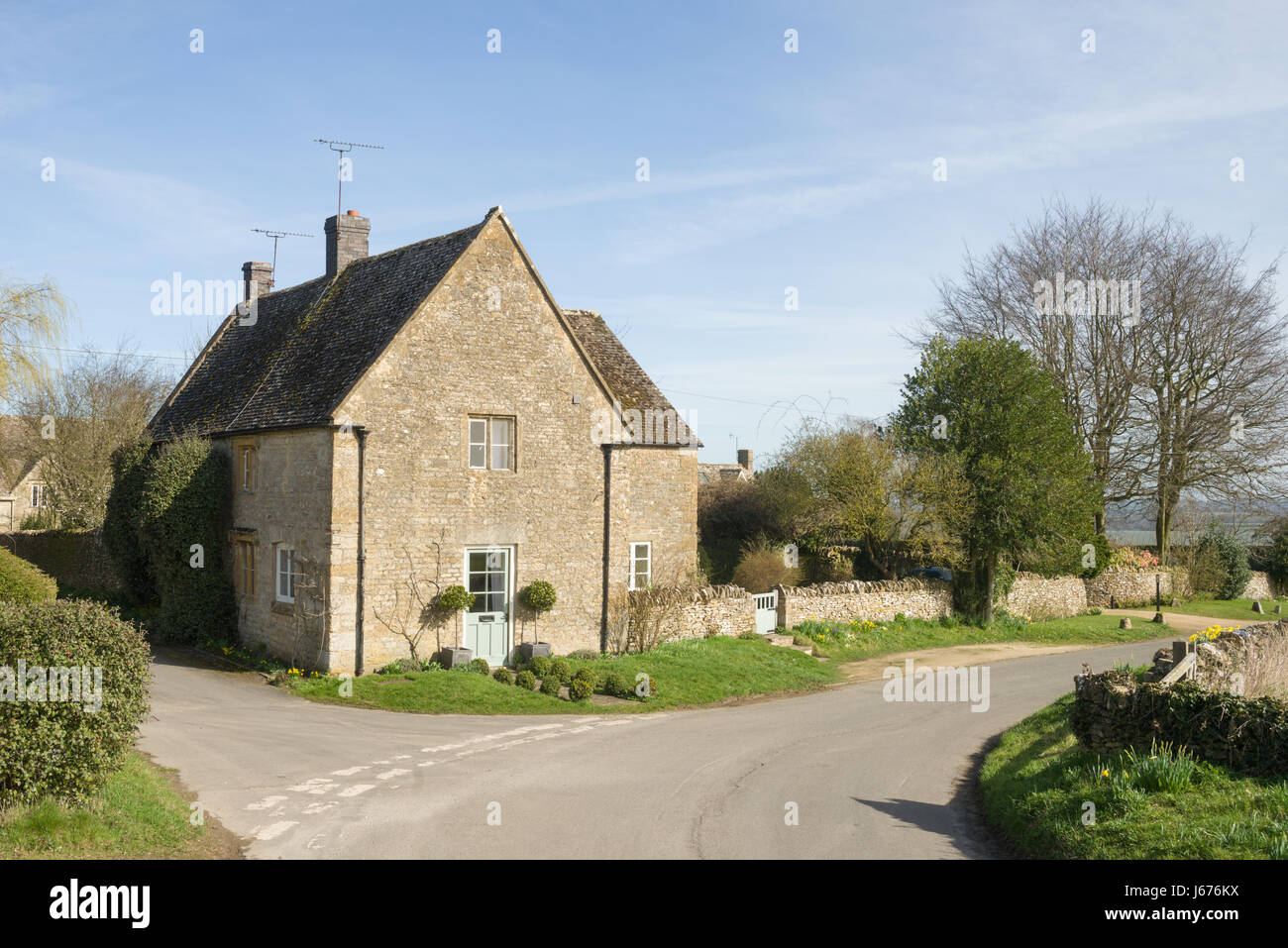 A view towards a traditional Cotswold home in Donnington, near Stow-on ...