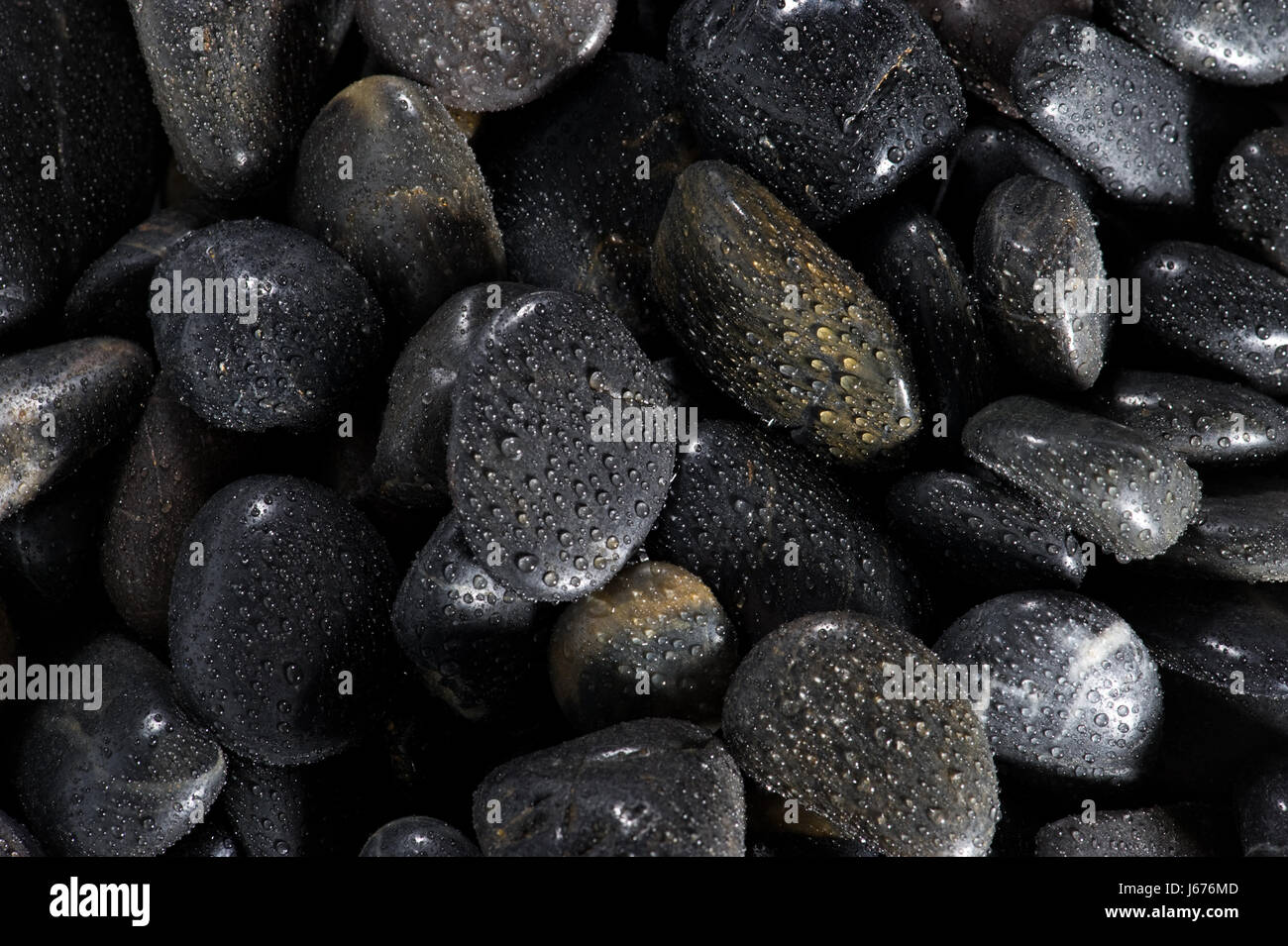 closeup stone raindrop drop wet smooth water drip drops seeping sopping ...