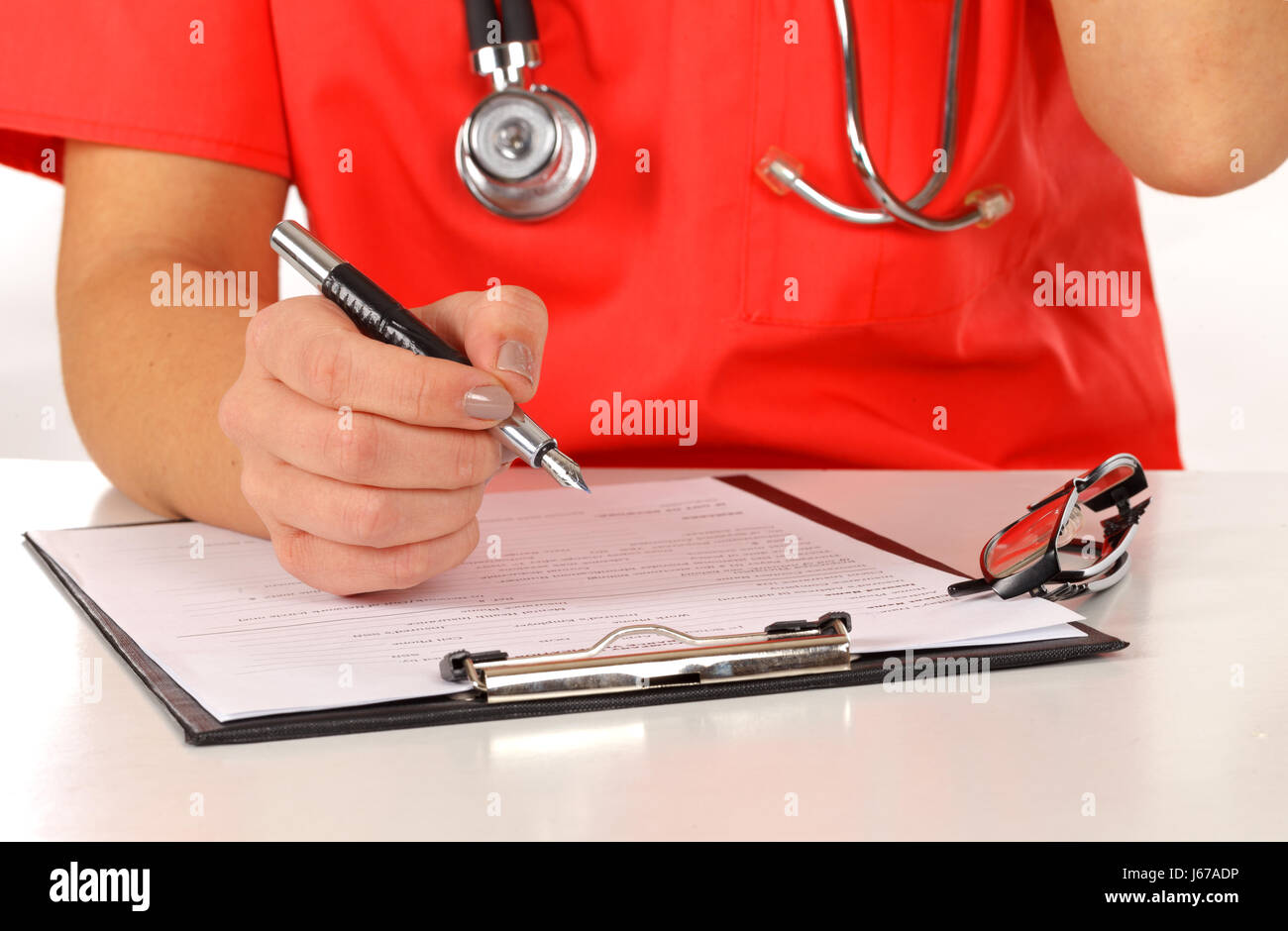 Picture of a doctor's hand signing on the medical report Stock Photo ...