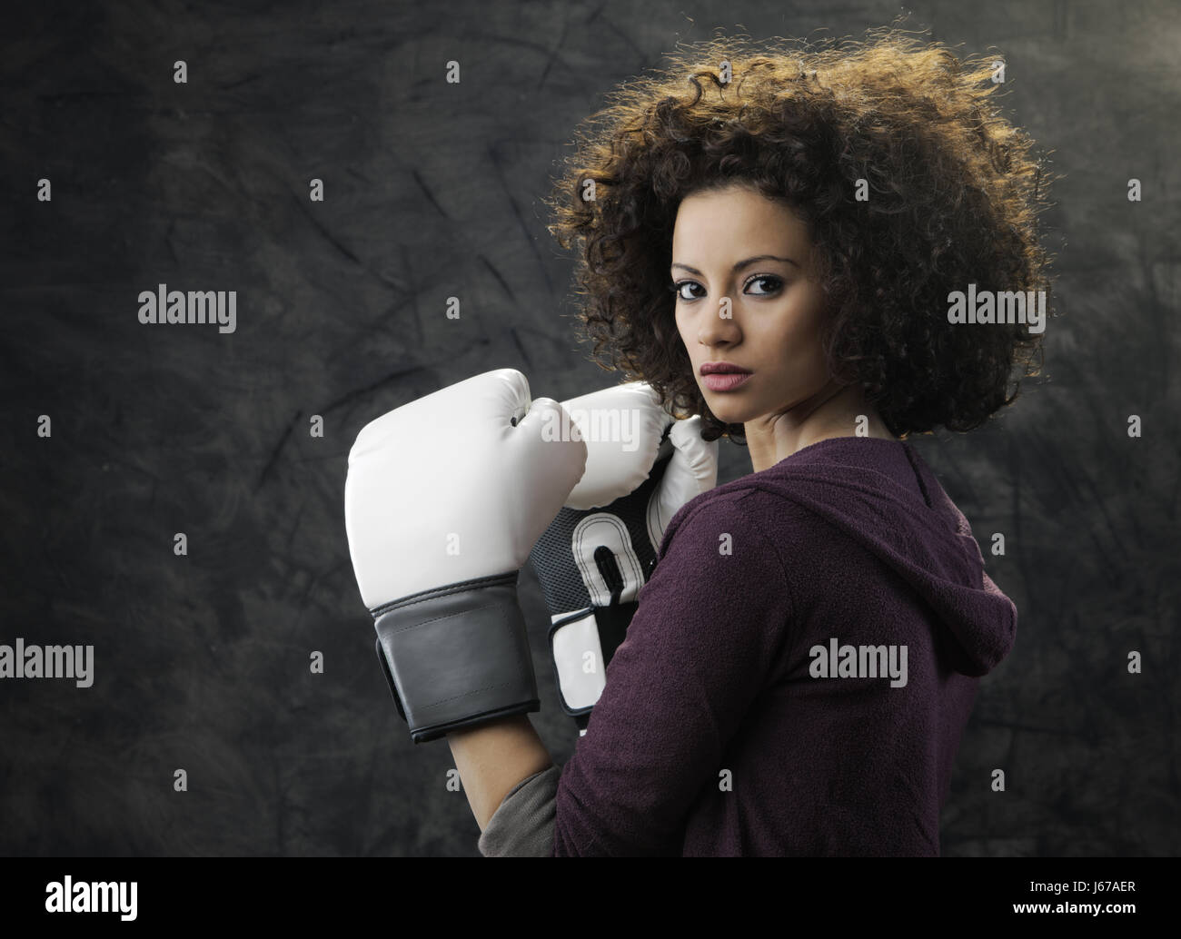 Fashion model with white boxing gloves Stock Photo - Alamy