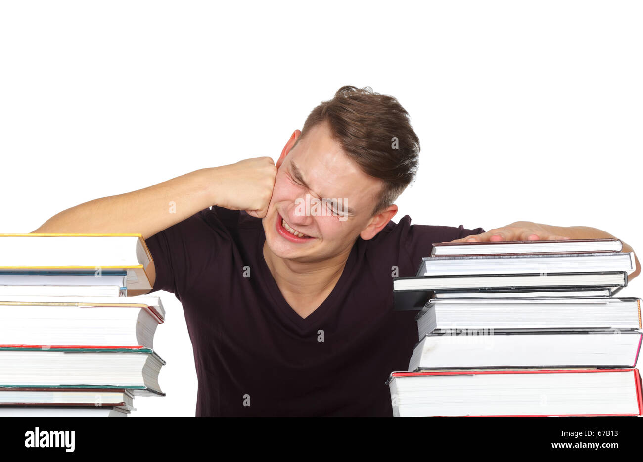 Photo of a stressful college student who try to study Stock Photo - Alamy