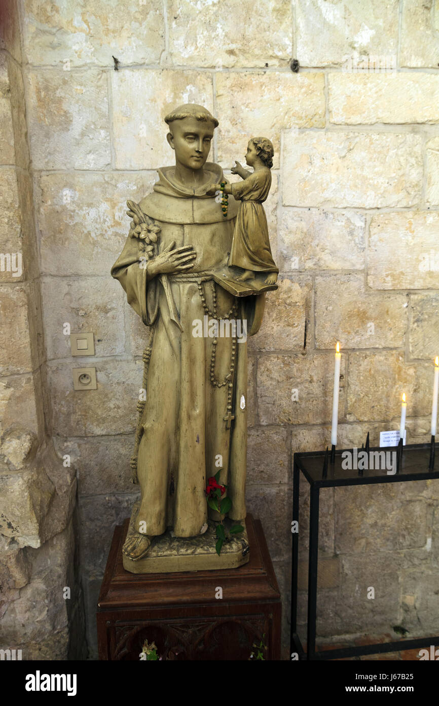 Statue of a Monk Holding a Child in The Basilca of Fleury Abbey at ...
