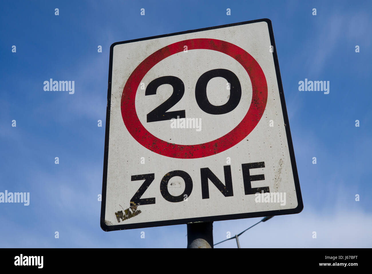 UK 20 mph zone warning sign Stock Photo - Alamy