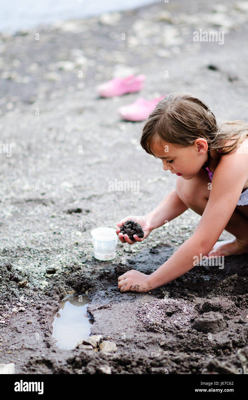 Children playing in dirt hi-res stock photography and images - Alamy