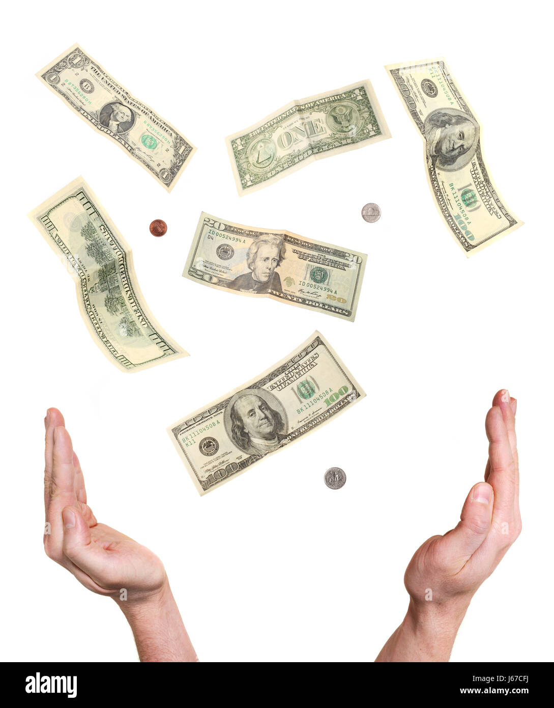 Money falling in the hands Cut Out Stock Images & Pictures - Alamy