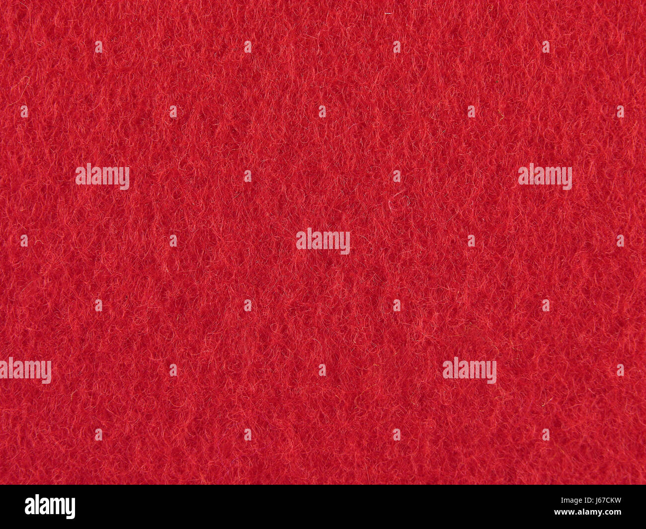 rough felt backdrop background red fiber material texture macro close ...