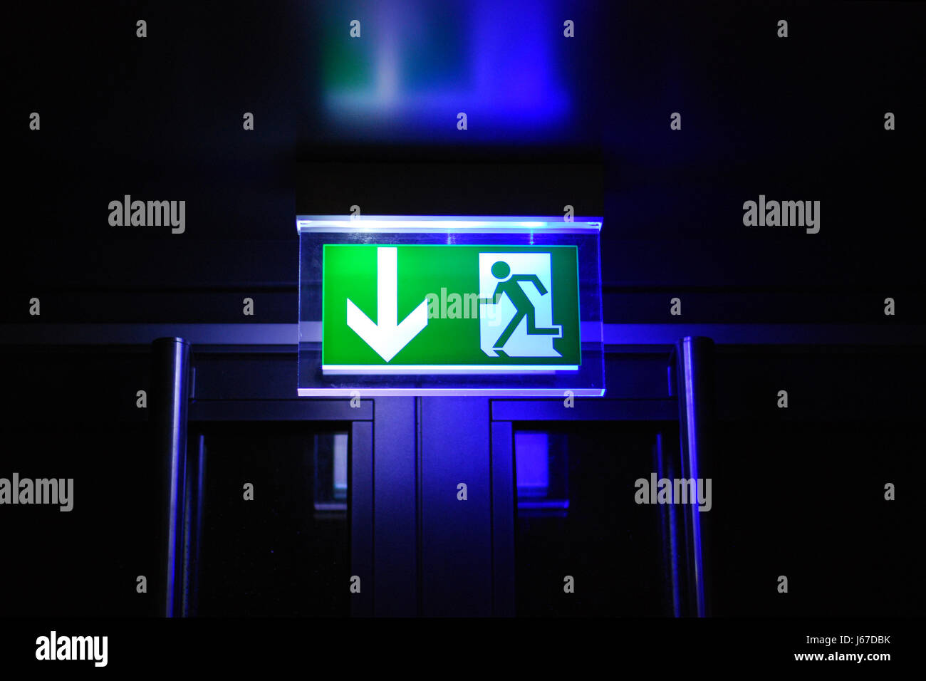 sign signal blue night nighttime lighted neon dark lighting ...
