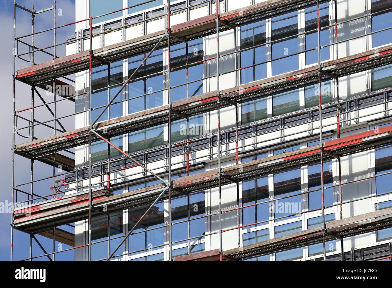 scaffolding at office building currently under construction Stock Photo ...