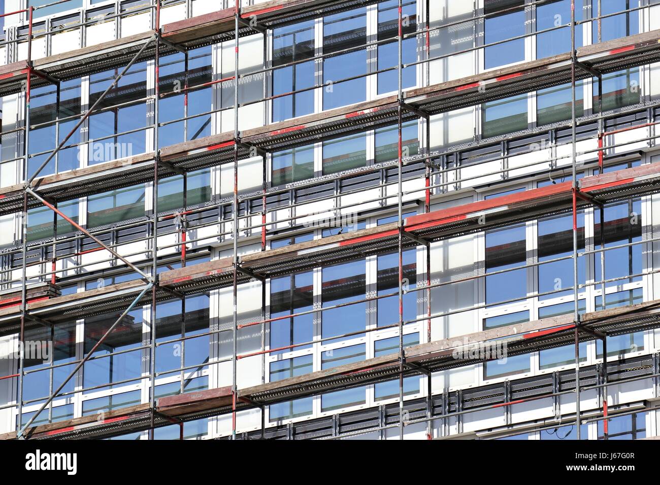 scaffolding at office building currently under construction Stock Photo ...