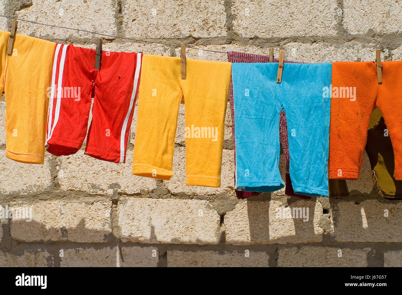 Coloured trousers hi-res stock photography and images - Alamy