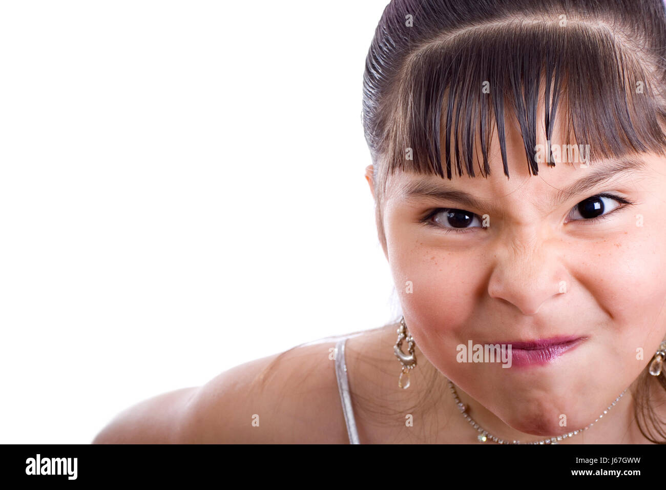 female closeup frustrated raving furious angry irately kid child humans ...