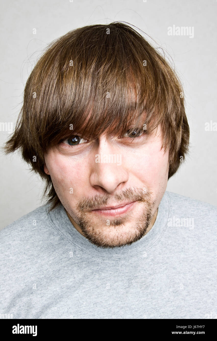 face portrait grimace crazy insane young younger man humans human ...