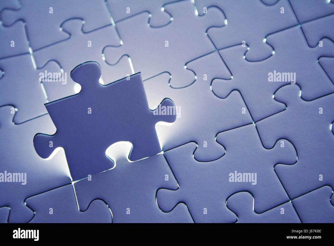 Teamwork symbolized by jigsaw-puzzle Stock Photo - Alamy