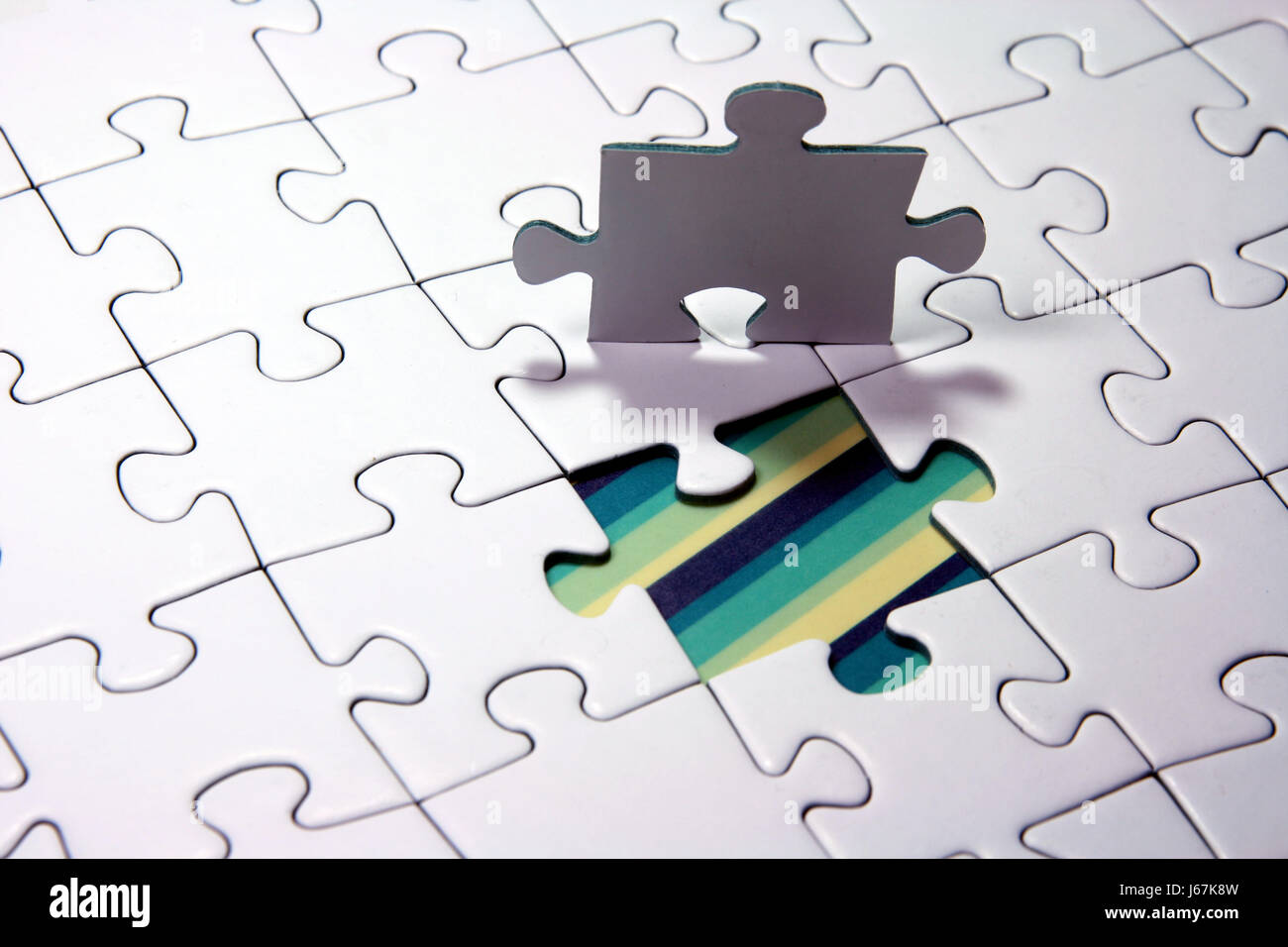 Jigsaw Puzzle nearly complete Stock Photo - Alamy