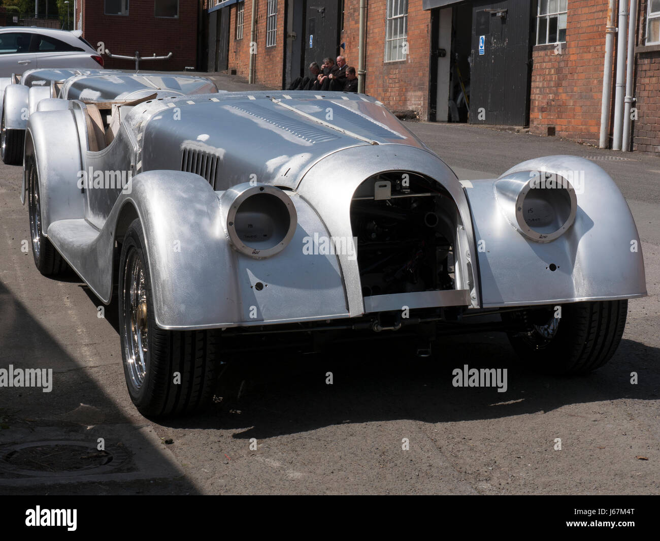 Morgan autos in line awaiting entry into the factory paint shop. Each ...
